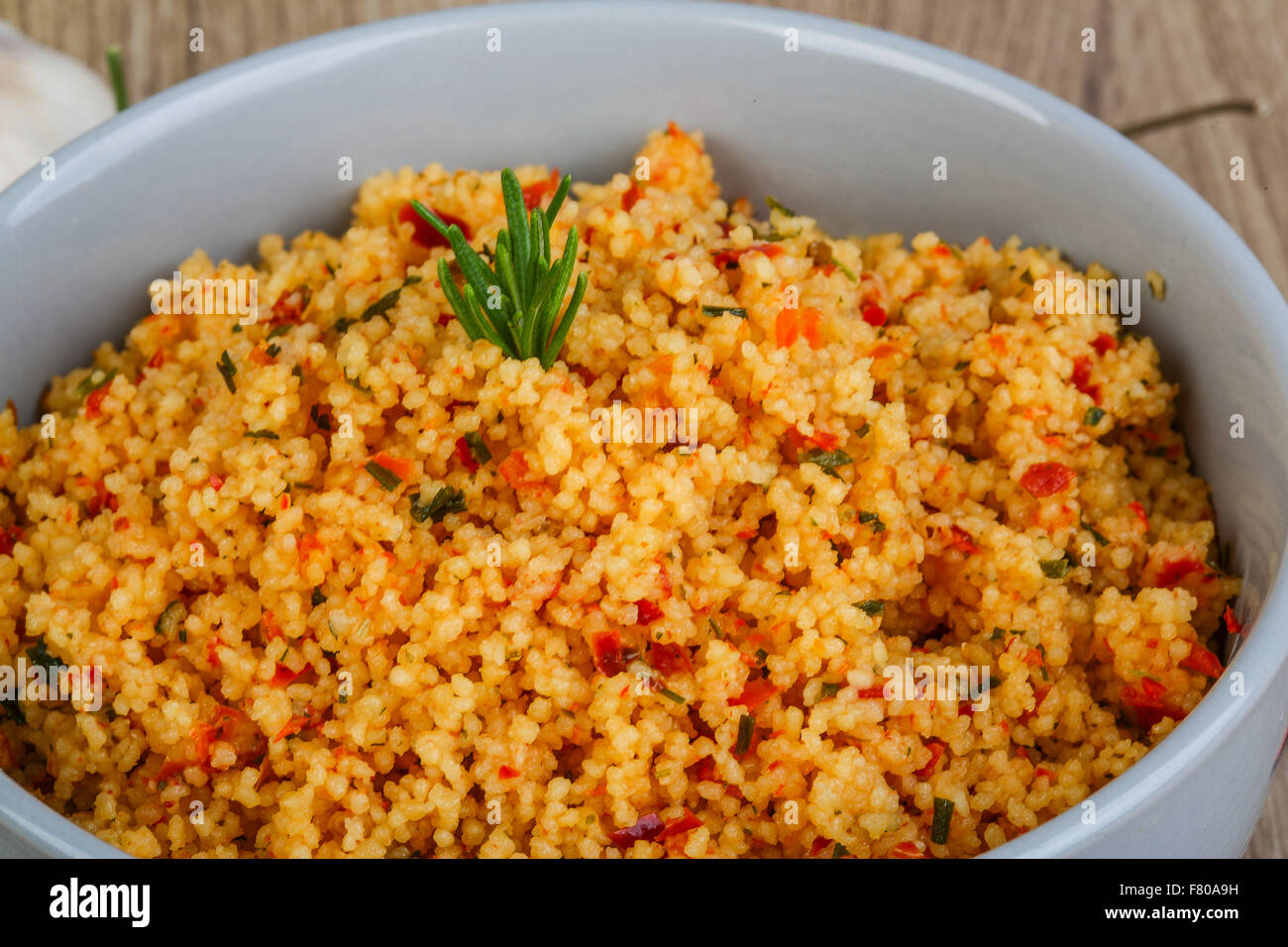Arabic traditional cuisine - Couscous with tomato and green onion Stock ...