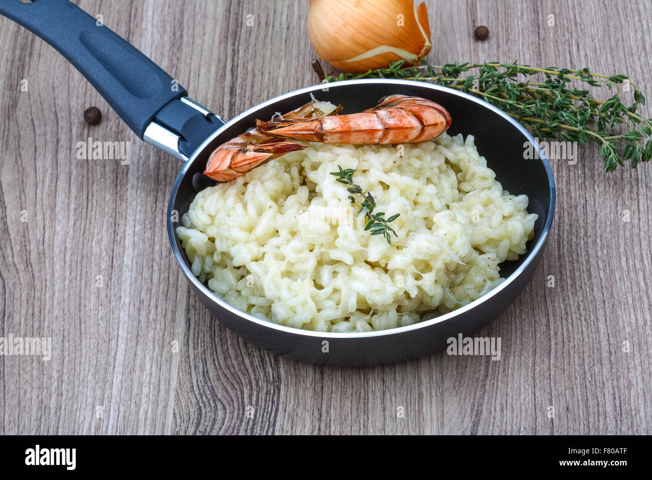 Italian trditional Risotto with tiger prawn and thyme Stock Photo - Alamy