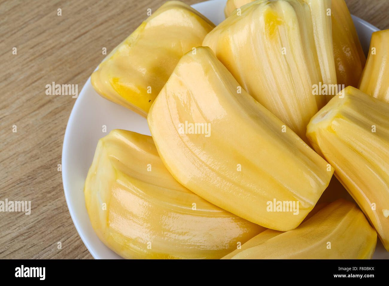 Tropical Jack Fruit on the wood background Stock Photo - Alamy