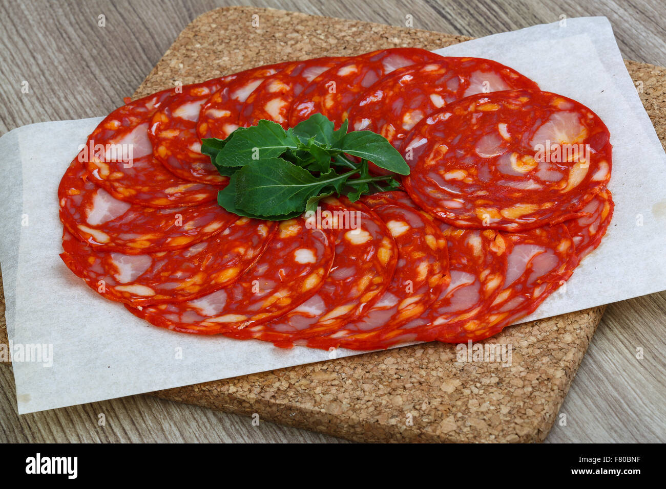 Traditional Spanish salami - Chorizo sausage on the wood background ...