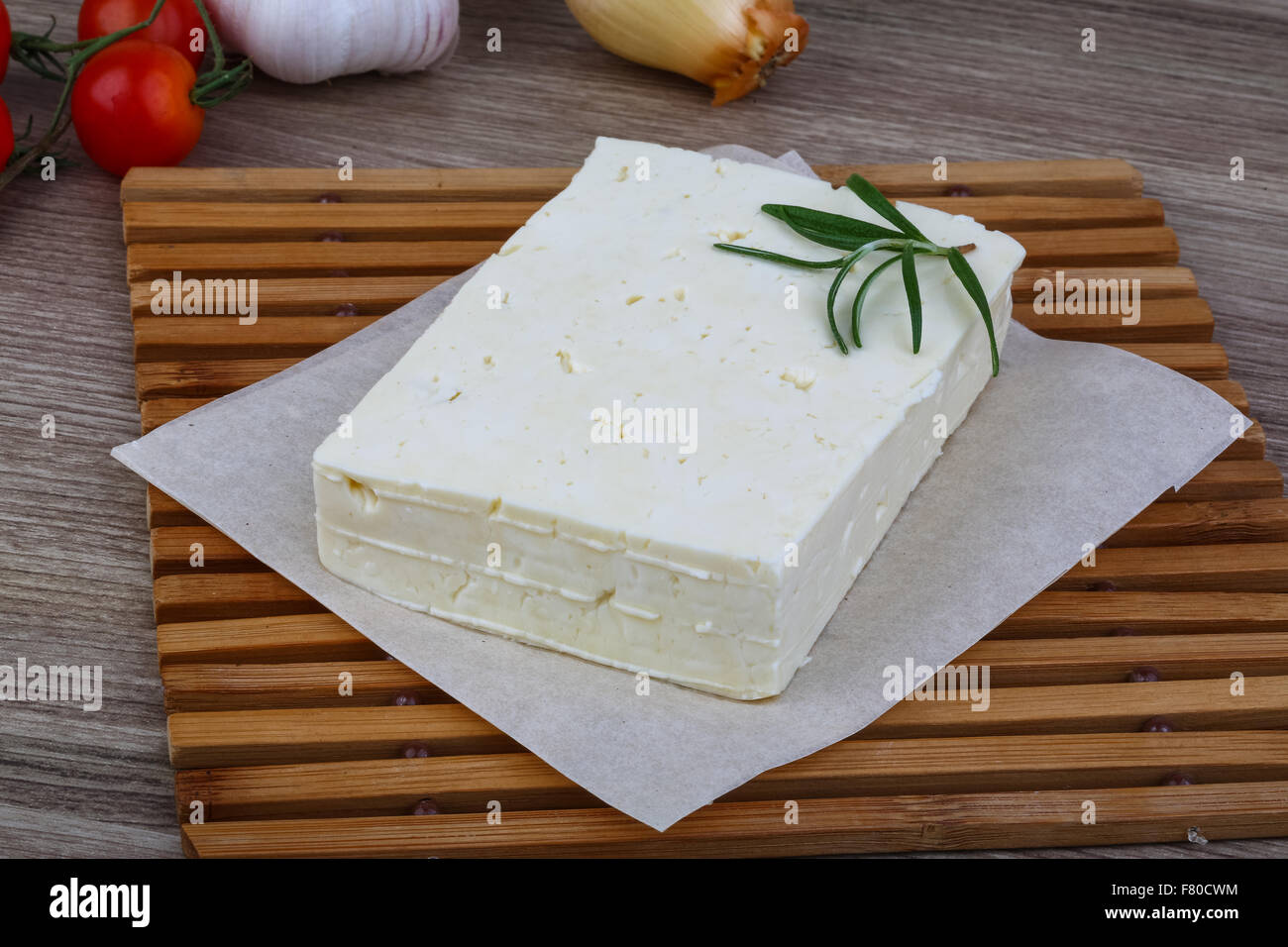 Traditional Caucasian homemade Cheese Brinza with rosemary on wood ...