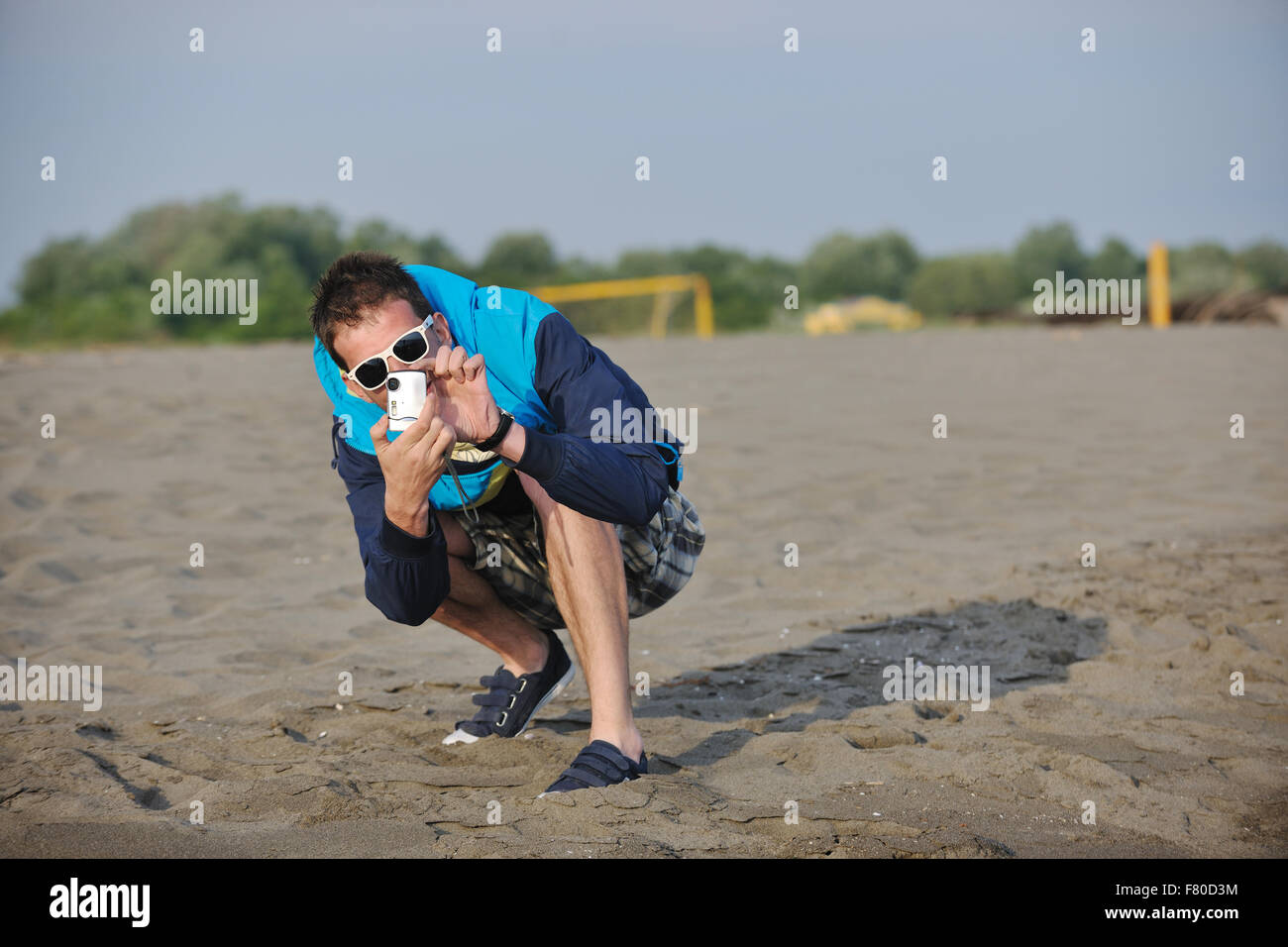 young creative amateur photographer taking snapshot photo with ...