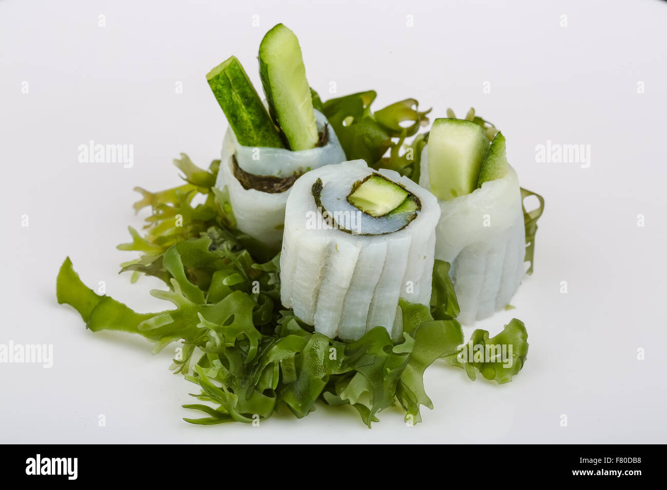 Cold Squid sashimi with cucumber and nori Stock Photo - Alamy