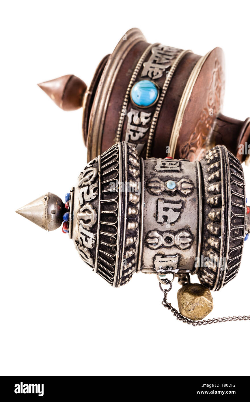 Tibetan Prayer wheel or Mani wheel isolated over a white background ...