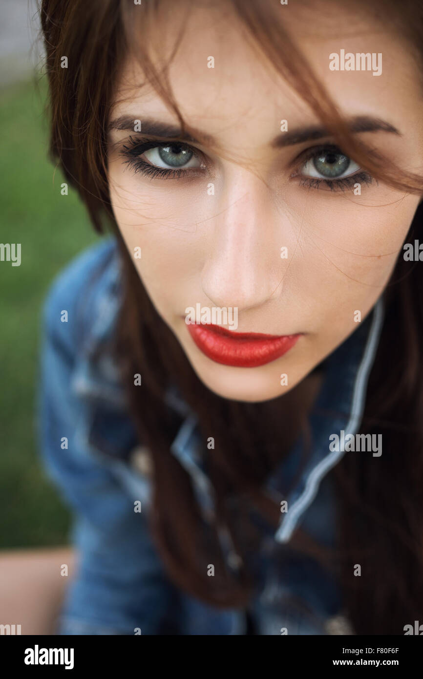 sad serious girl looking at camera Stock Photo - Alamy
