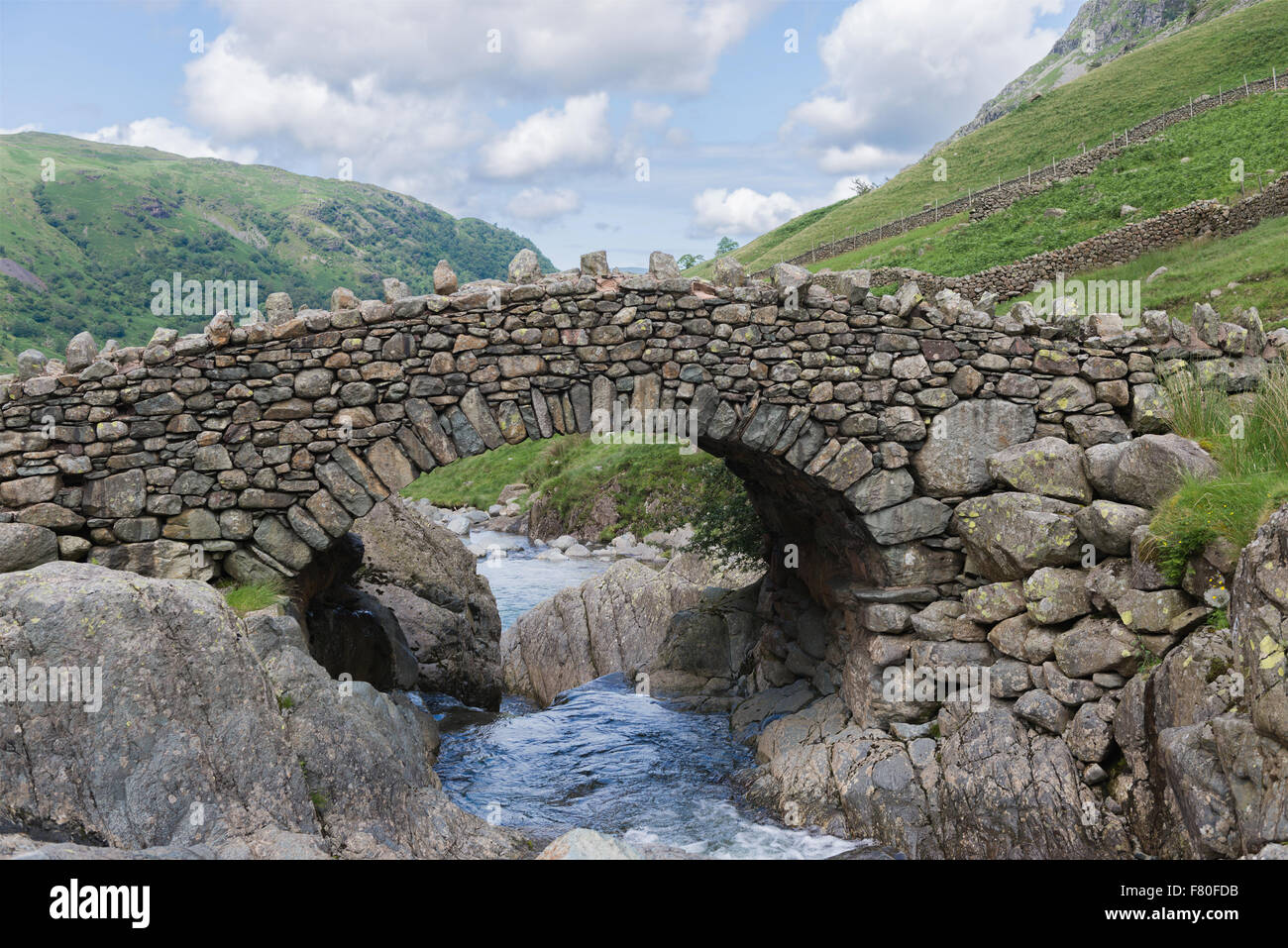 Stockley bridge, a traditional stone built bridge over Grains Gill near ...