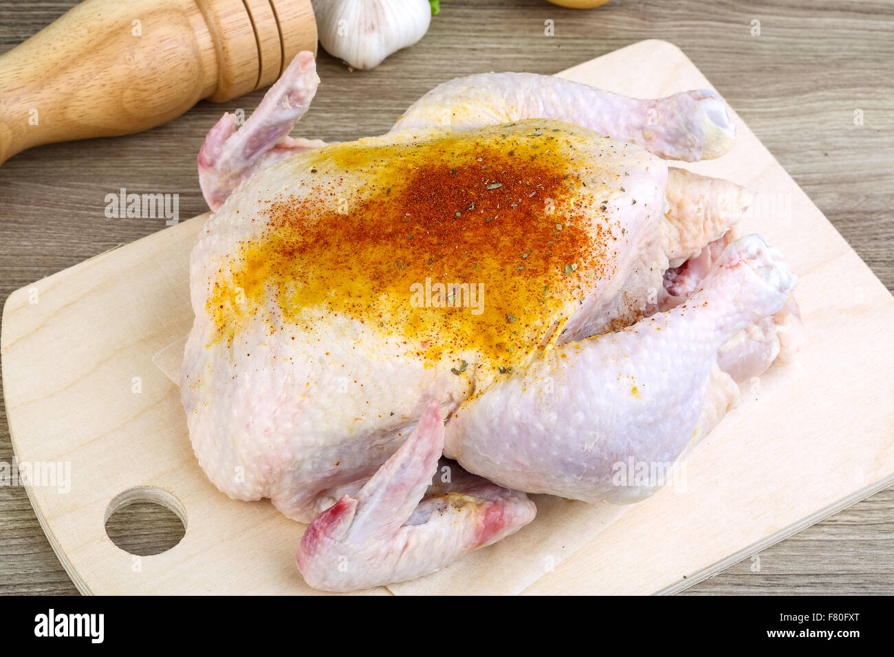 Raw chicken with spices ready for cooking Stock Photo - Alamy