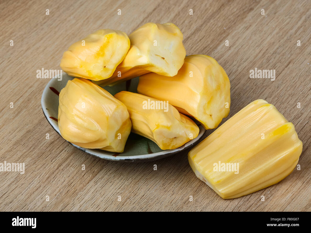 Tropical Jack Fruit on the wood background Stock Photo - Alamy