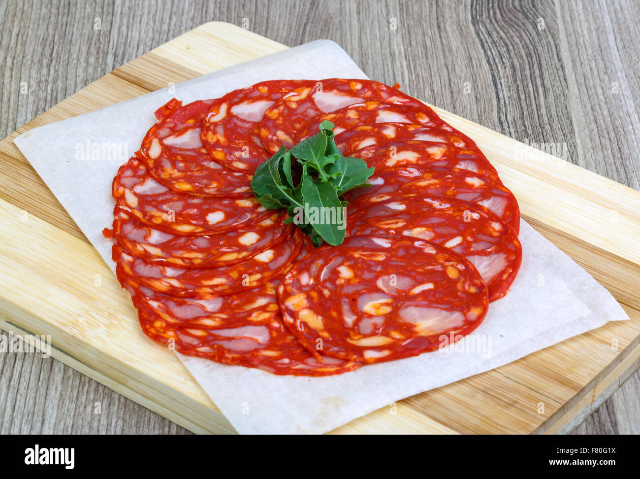 Traditional Spanish salami - Chorizo sausage on the wood background ...