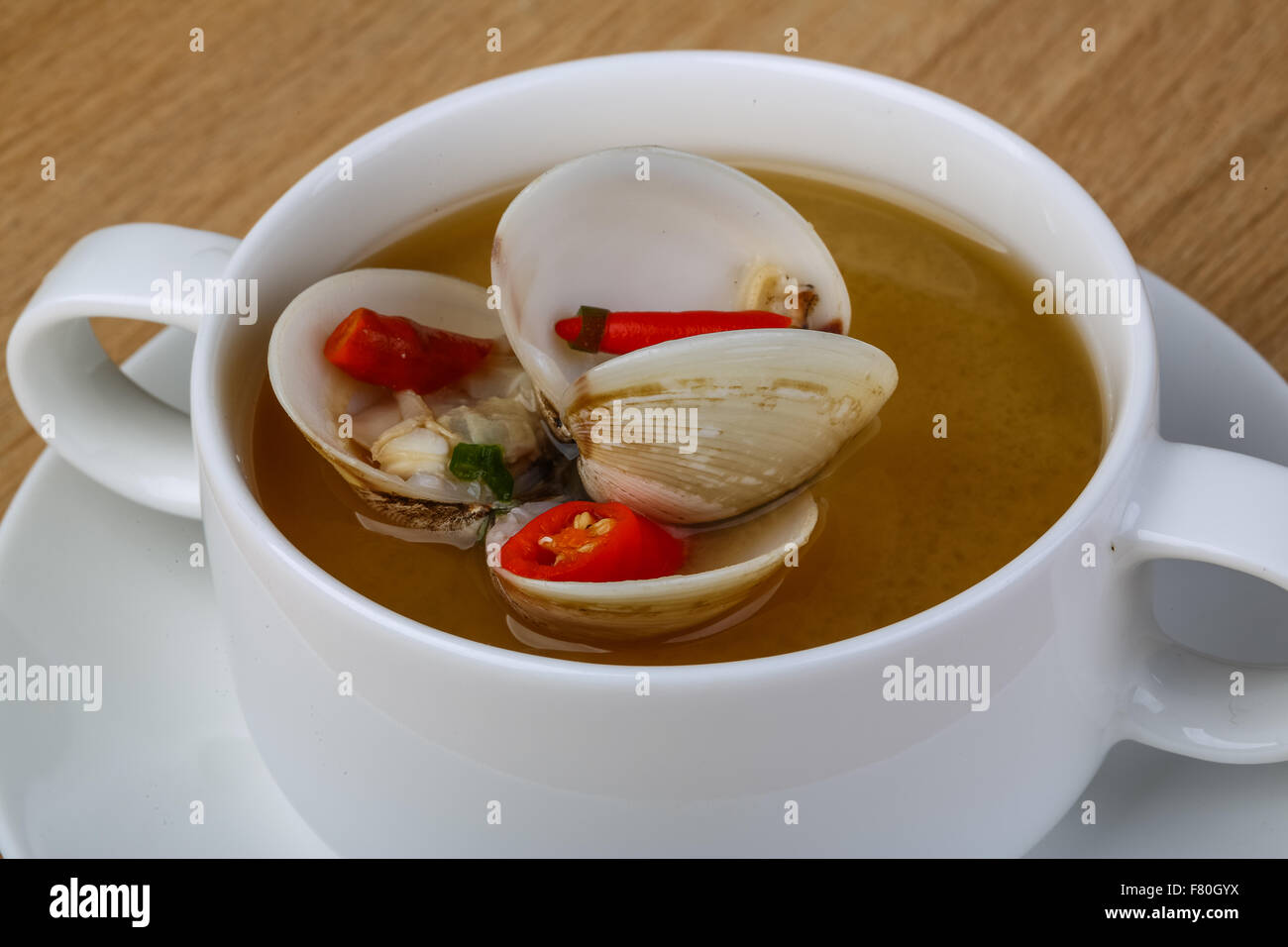 Asian traditional Shell soup on the wood background Stock Photo - Alamy