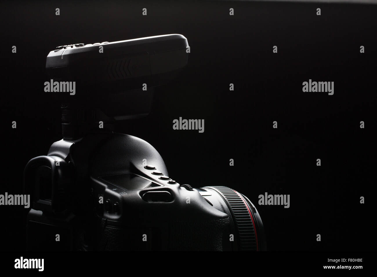 Professional modern DSLR camera low key image - Modern DSLR camera with ...