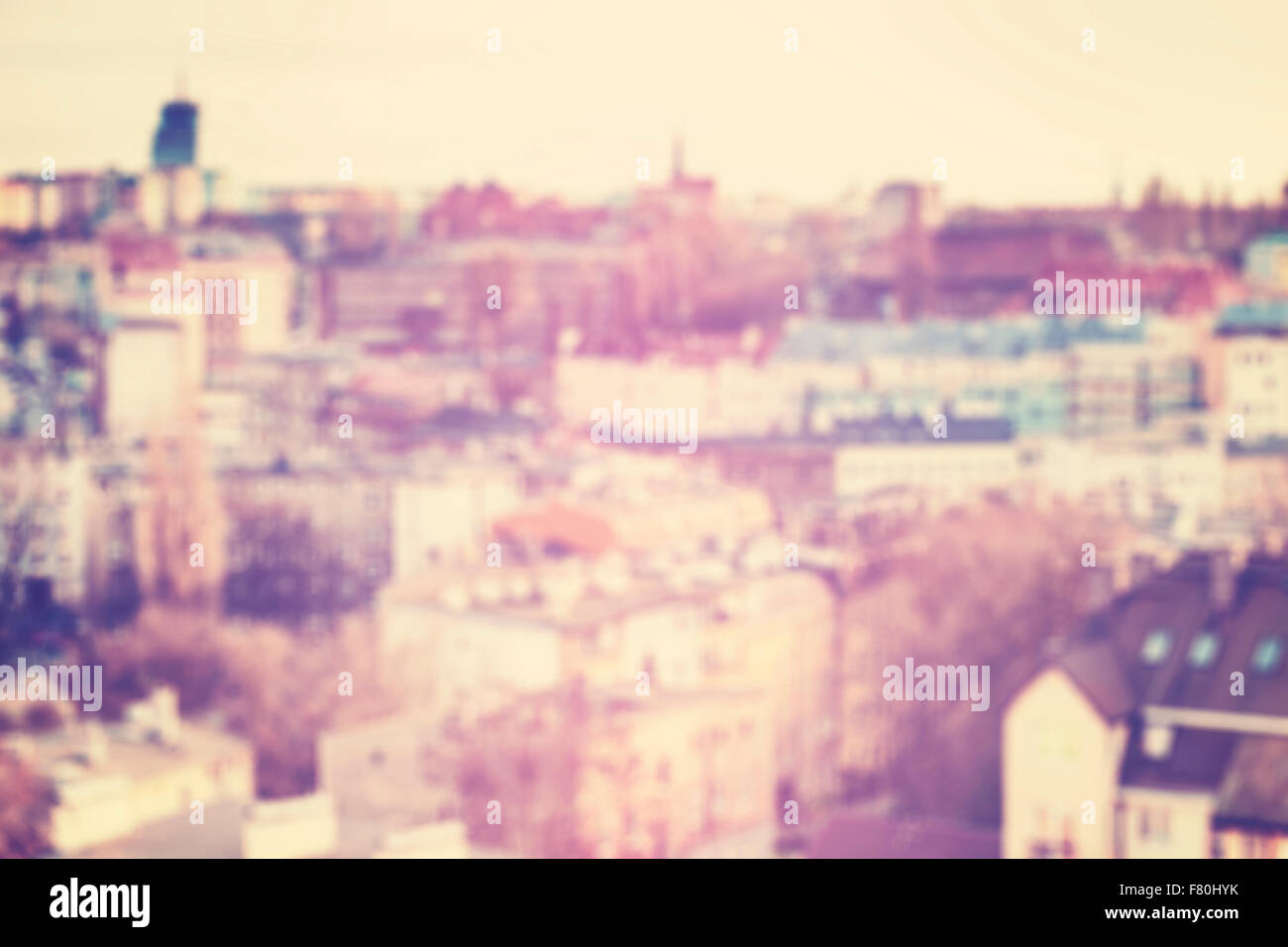 Purple vintage toned blurred urban background Stock Photo - Alamy