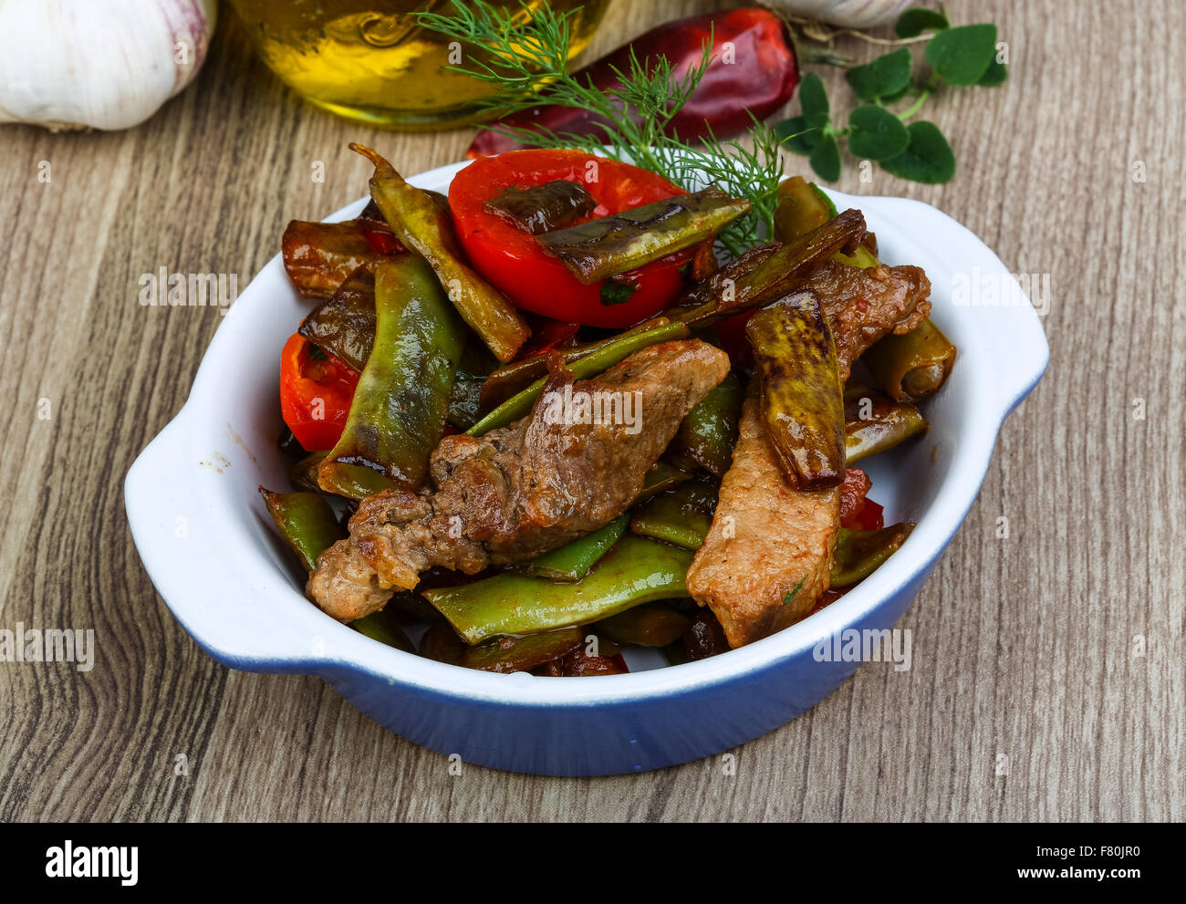 Asian cuisine - Stir fried pork with vegetables Stock Photo - Alamy