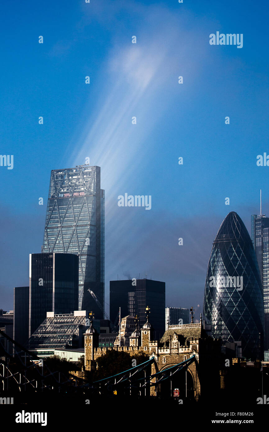 Sunlight reflects from the The Leadenhall Building and through the fog ...