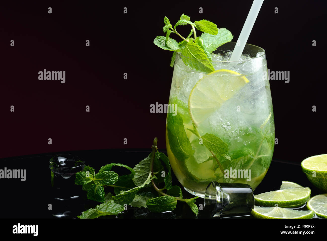 Mojito with lime ice and mint Stock Photo - Alamy