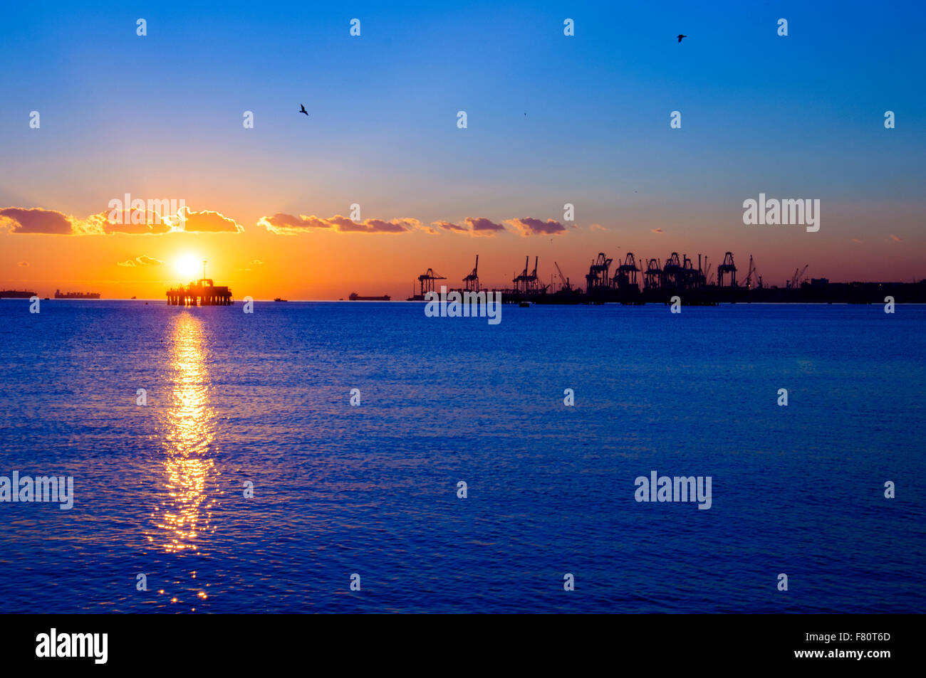 Offshore oil rig silhouette on the sunset in Istanbul Stock Photo - Alamy