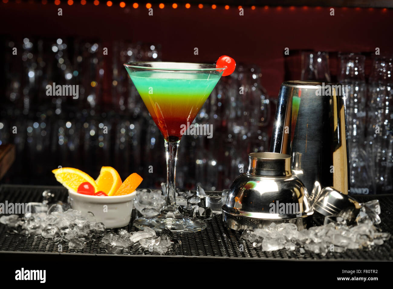 cocktail rainbow on the table with shaker Stock Photo - Alamy