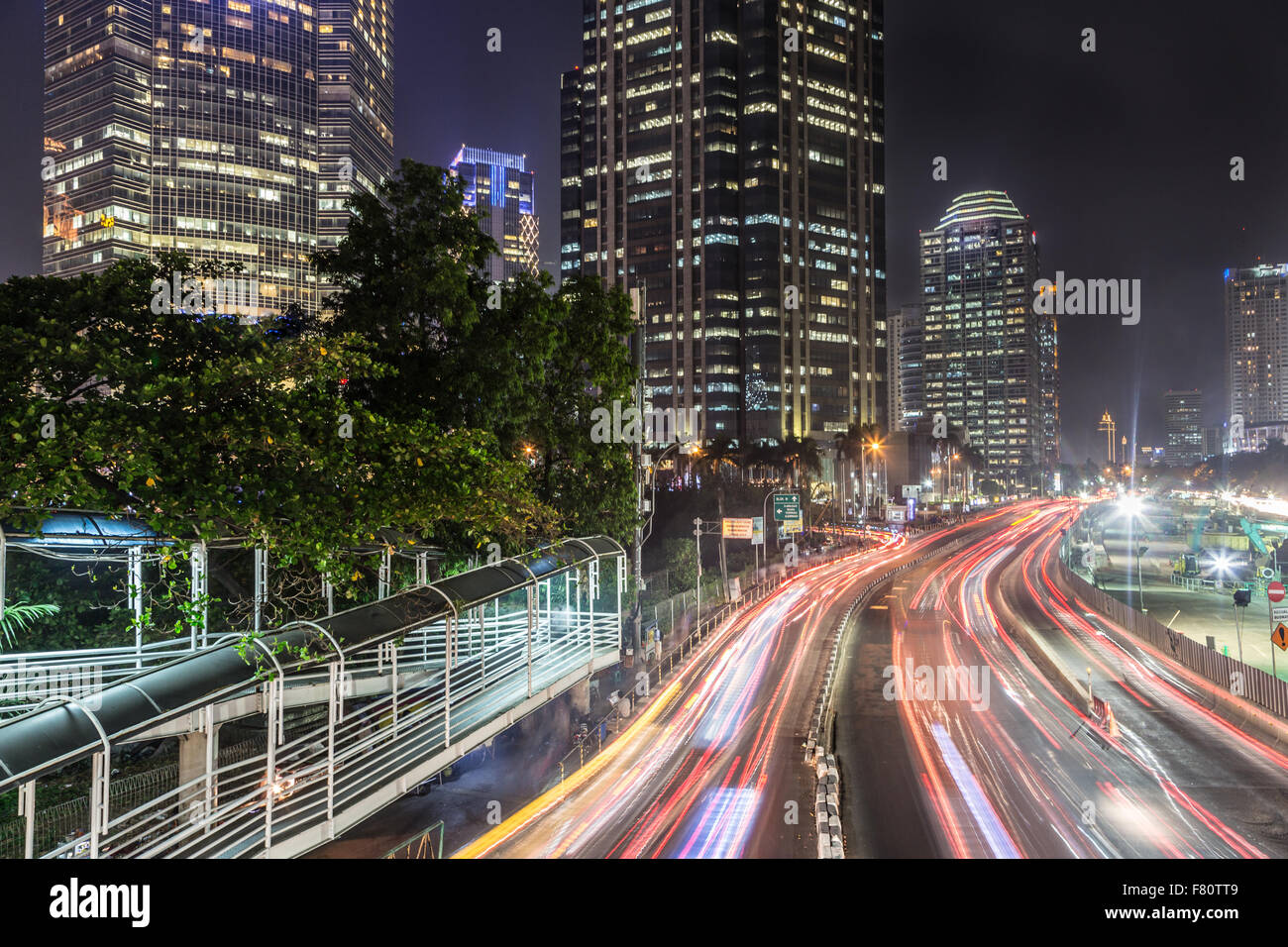 Traffic at night in Jakarta, along Indonesia capital city main avenue ...