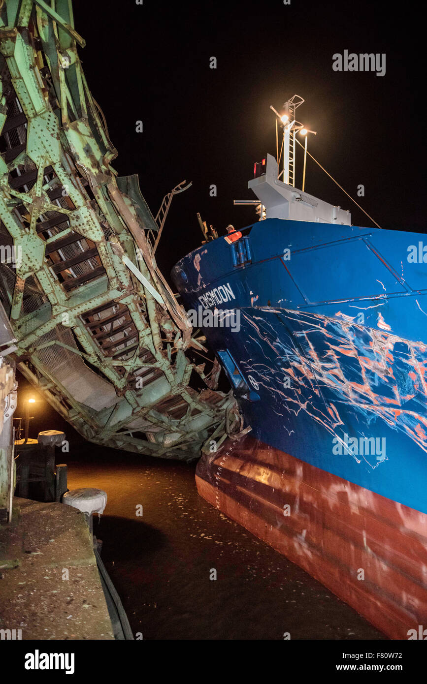 Weener, Germany. 3rd Dec, 2015. The hull of a damaged cargo ship is ...