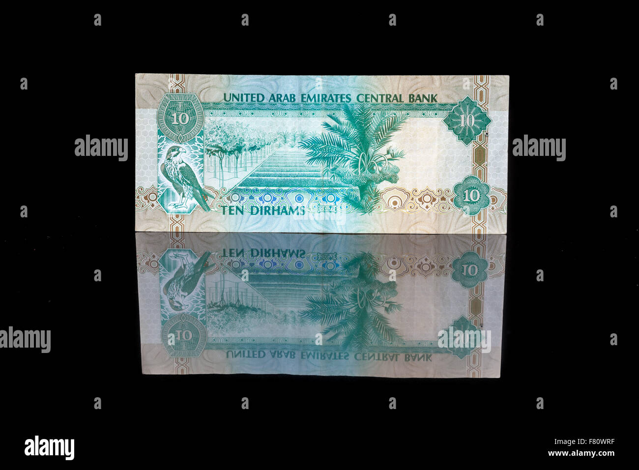 ten dirhams bill in reflection on black Stock Photo - Alamy
