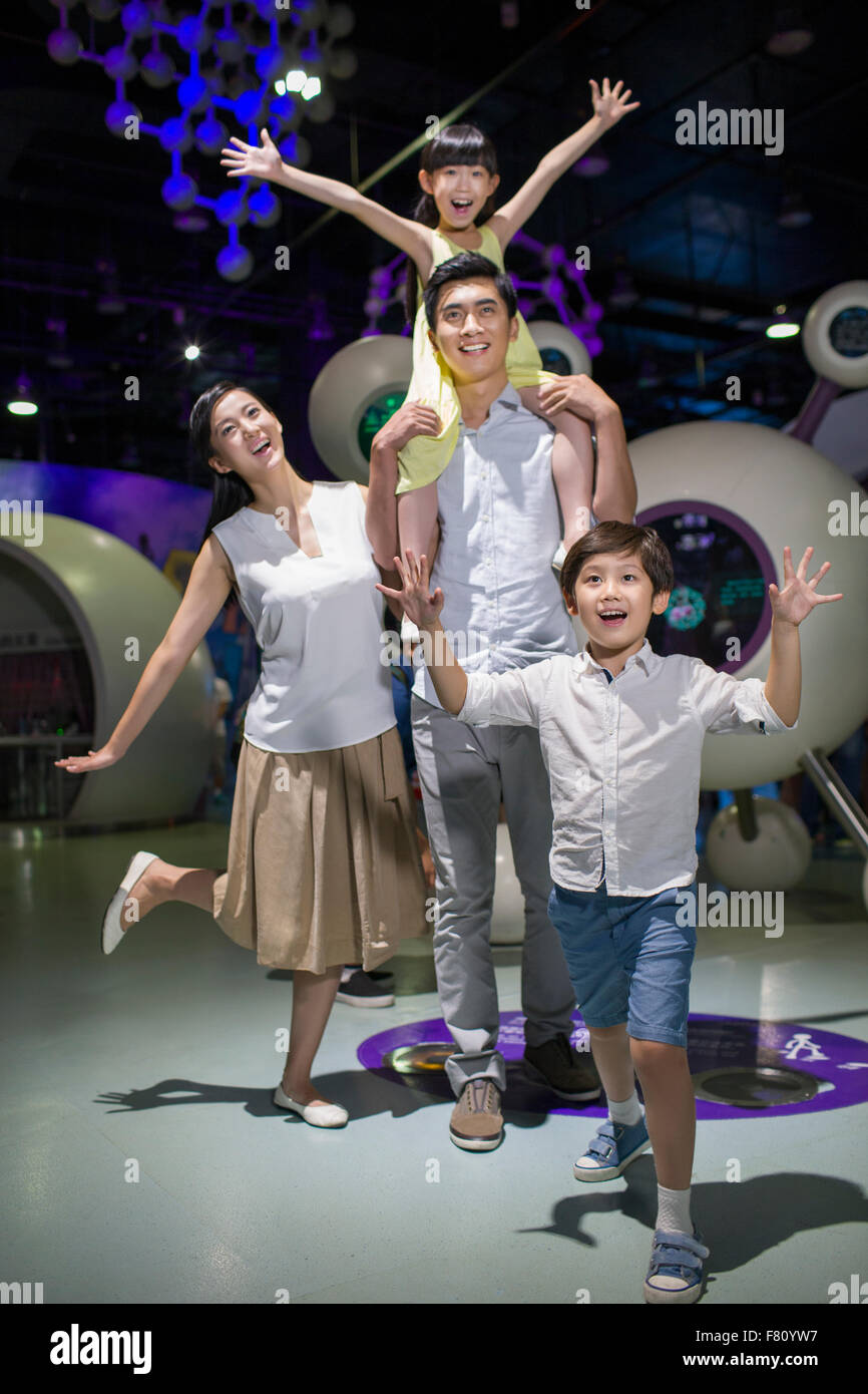 Young family in science and technology museum Stock Photo - Alamy
