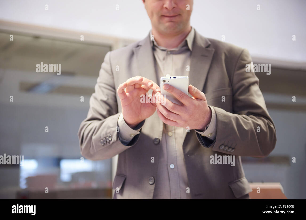 close up photo of business man work on phone at office Stock Photo - Alamy