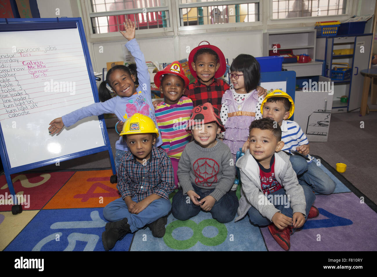 Preschool sitting on floor classroom hi-res stock photography and ...
