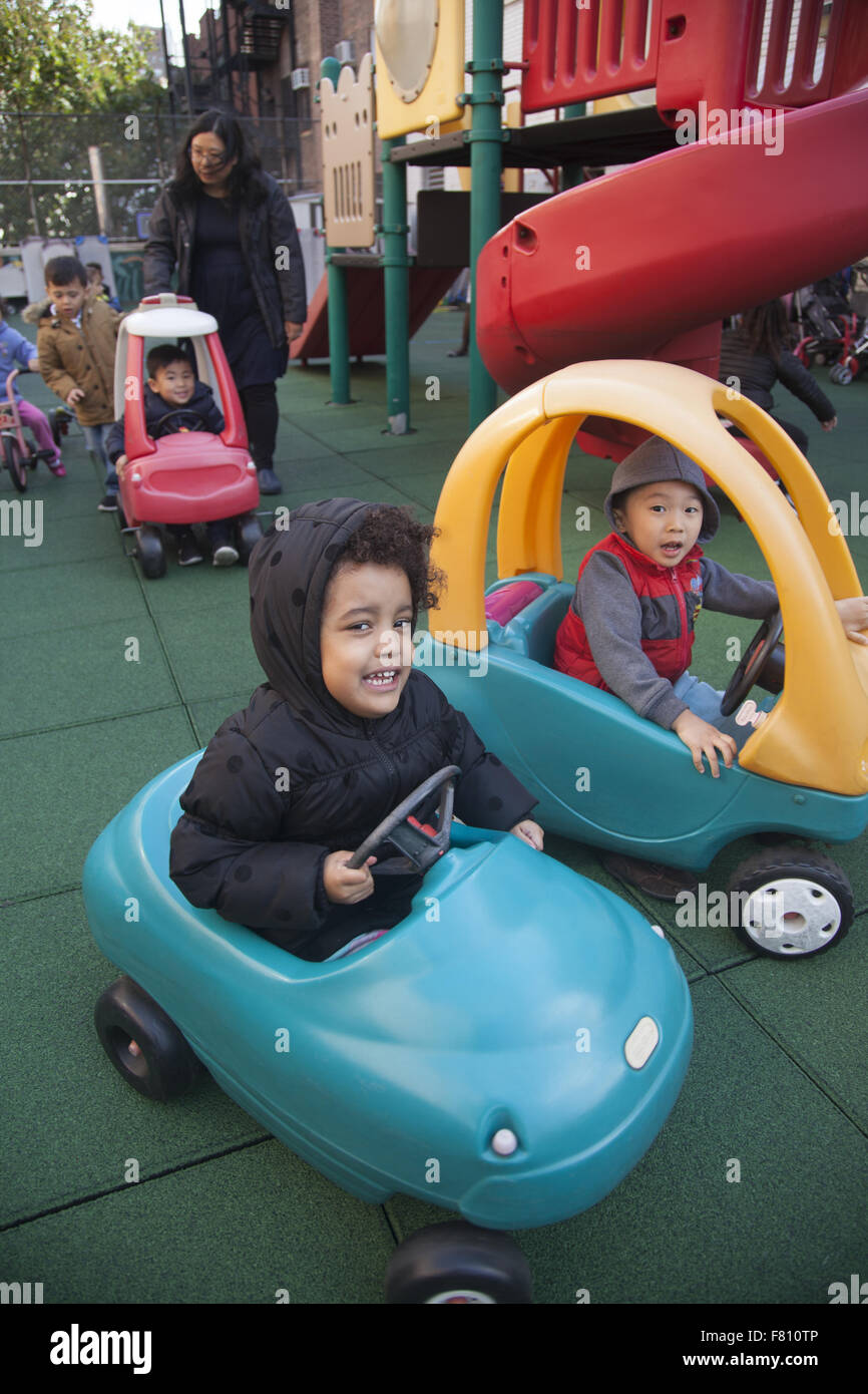Preschool children playing with cars hi-res stock photography and ...