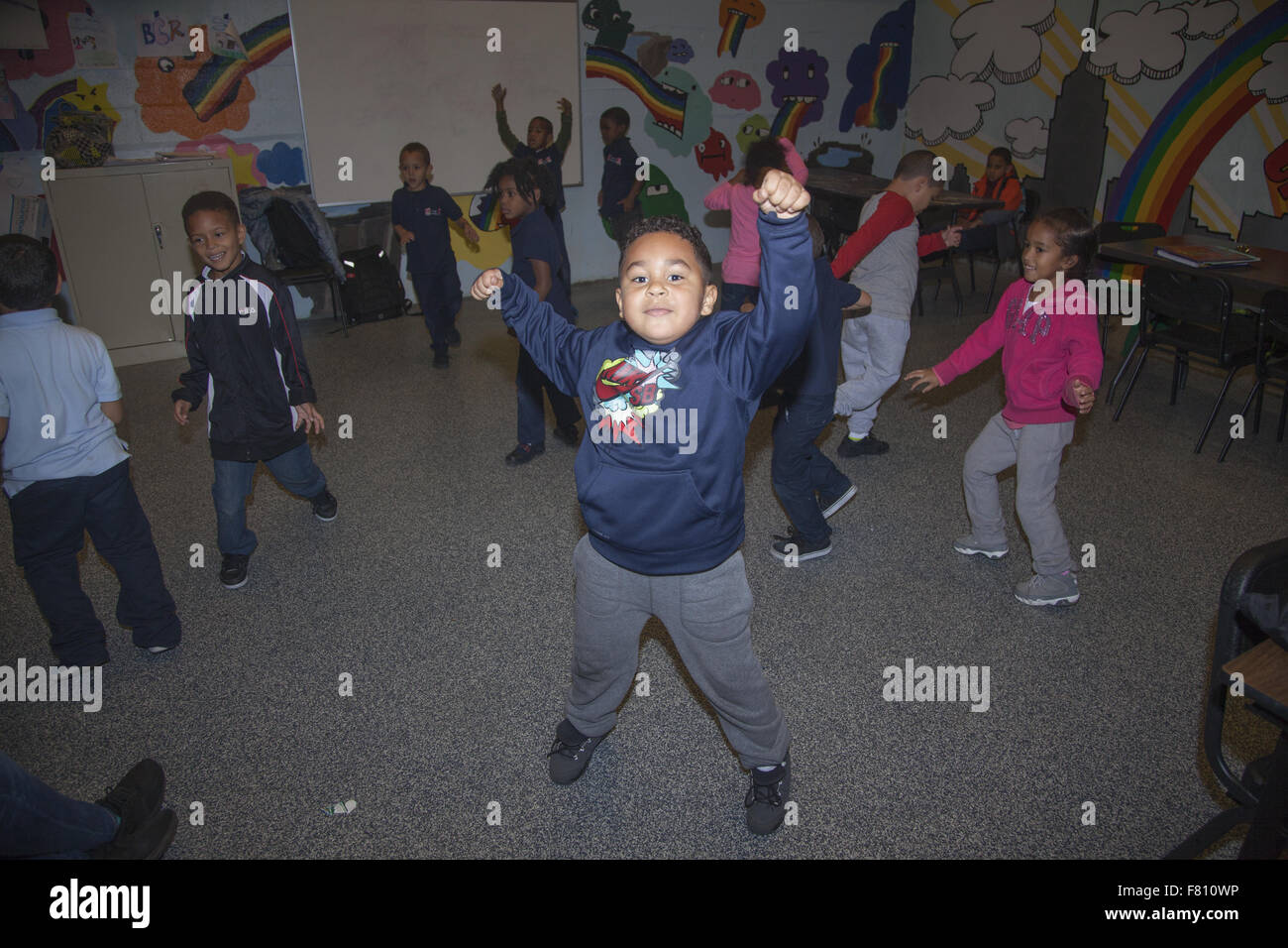 Children have fun dancing at a community center after school program ...