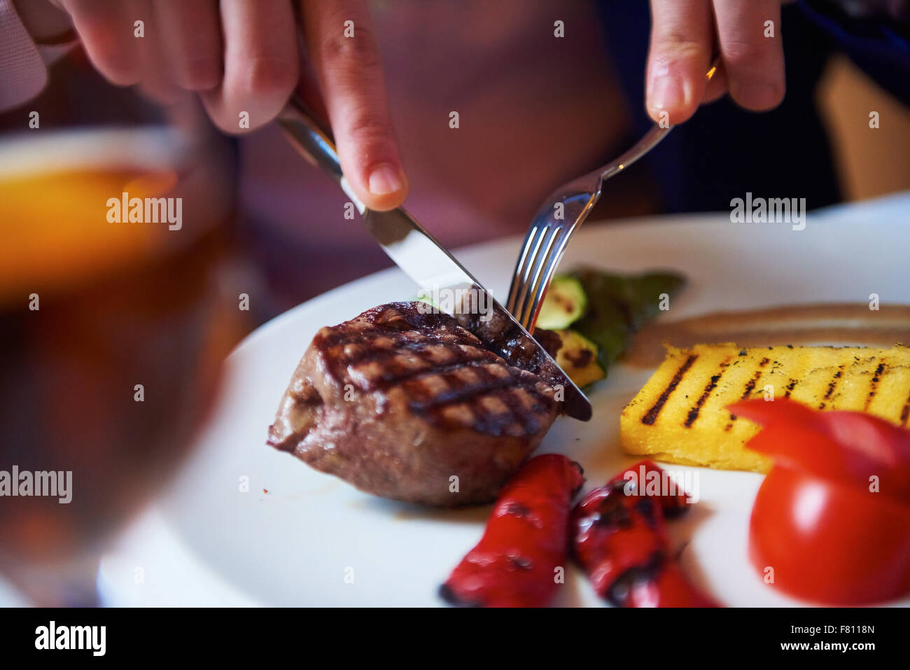 business man eating tasty beef stak at restaurant Stock Photo - Alamy