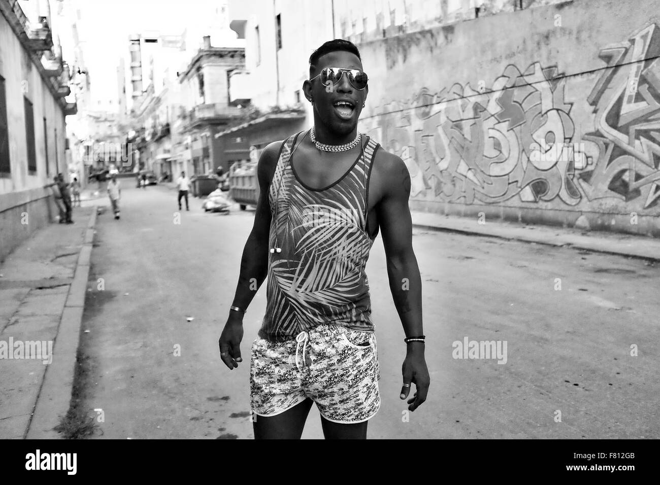 Young man shows on Black and White Stock Photos & Images - Alamy