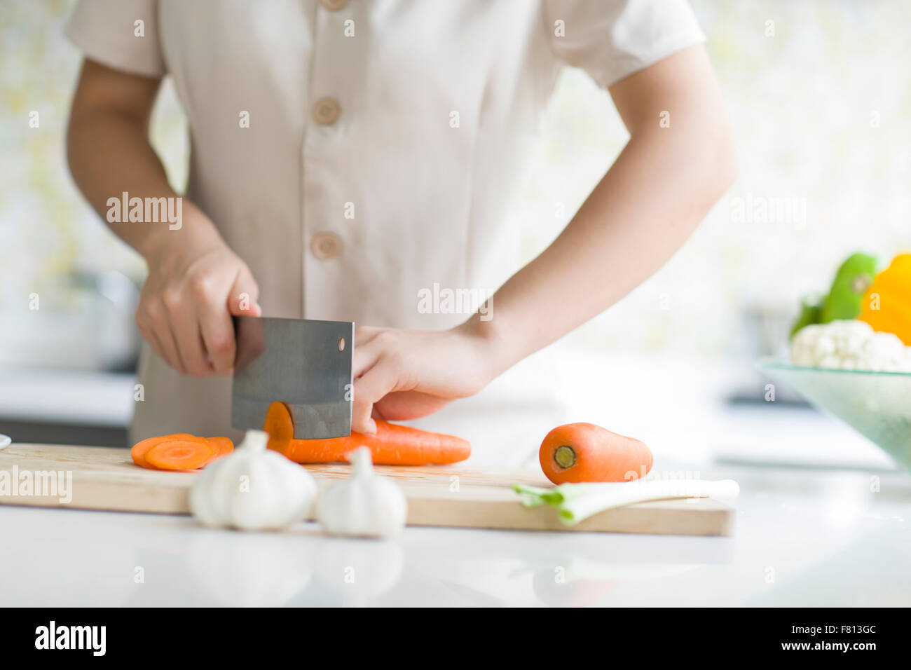 Domestic staff cooking in kitchen Stock Photo - Alamy