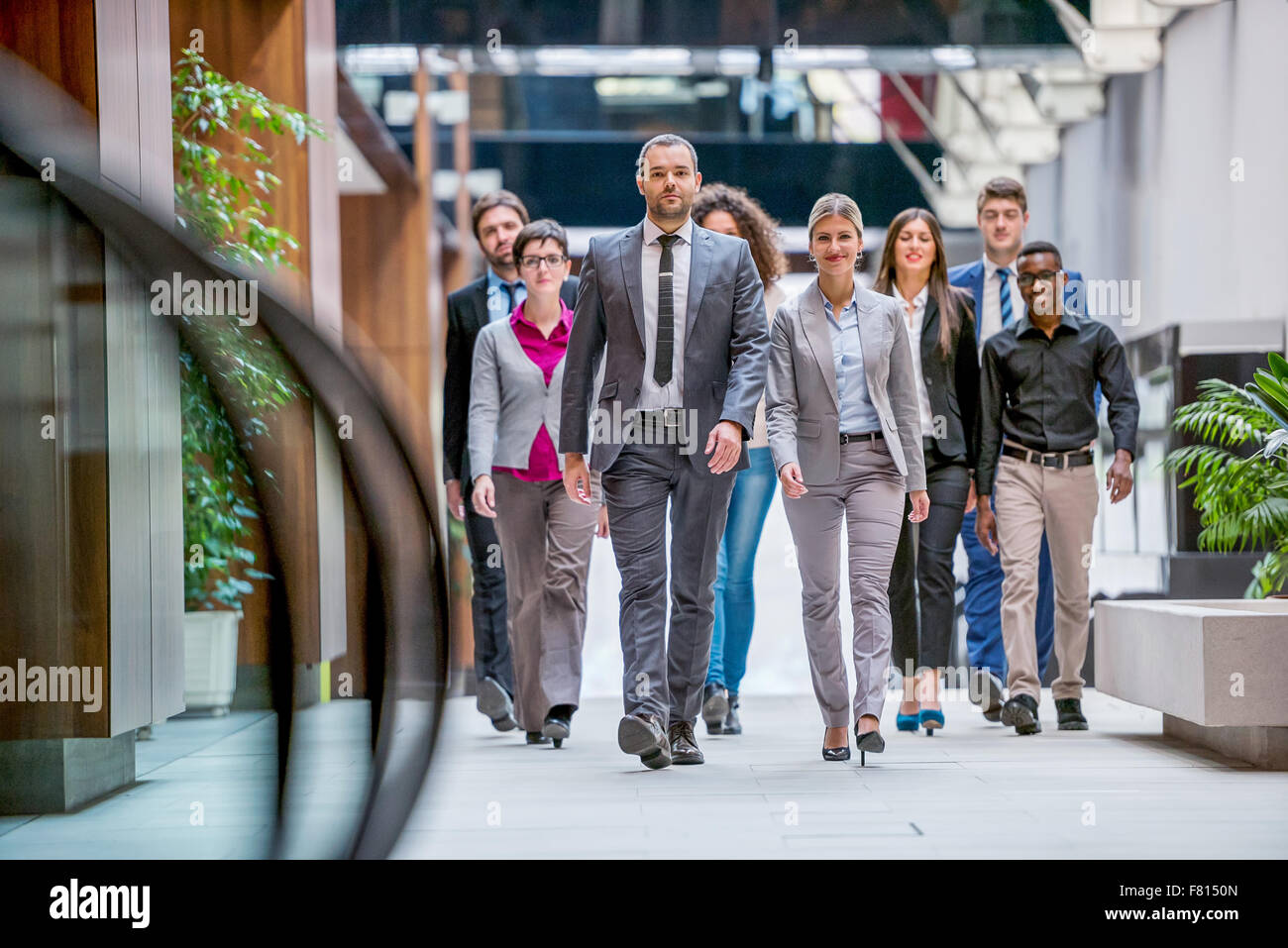 young multi ethnic business people group walking standing and top view ...