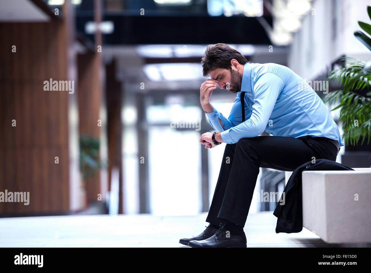 Young frustrated businessman sitting hi-res stock photography and ...