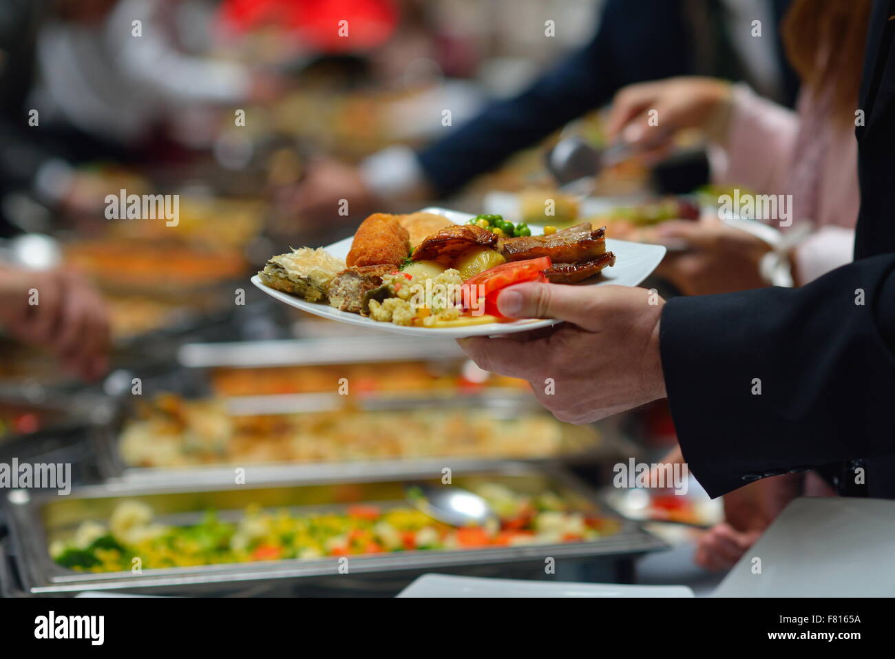people group catering buffet food indoor in luxury restaurant with meat ...