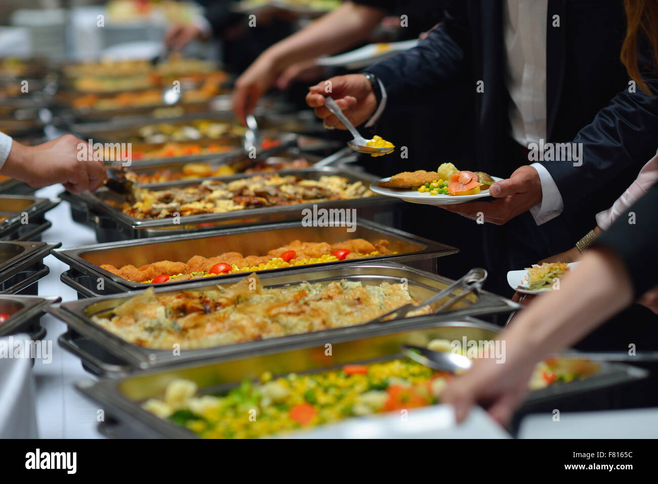 people group catering buffet food indoor in luxury restaurant with meat ...