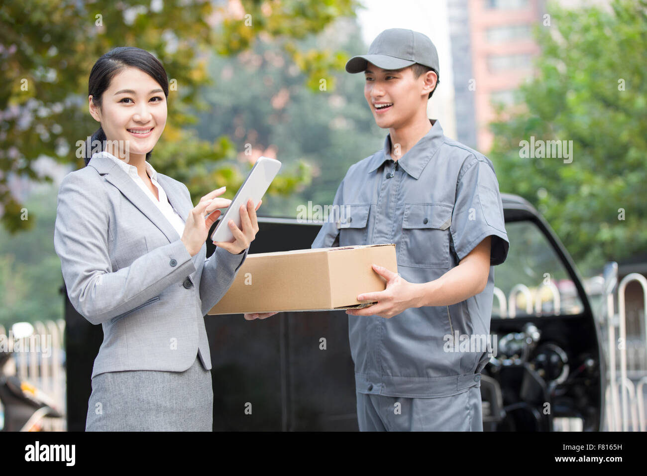 Signing merchandise hi-res stock photography and images - Alamy