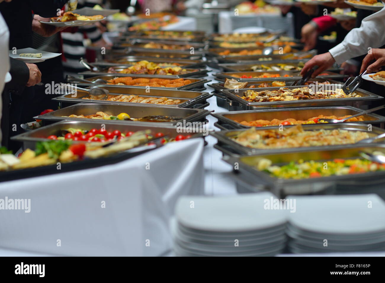 people group catering buffet food indoor in luxury restaurant with meat ...