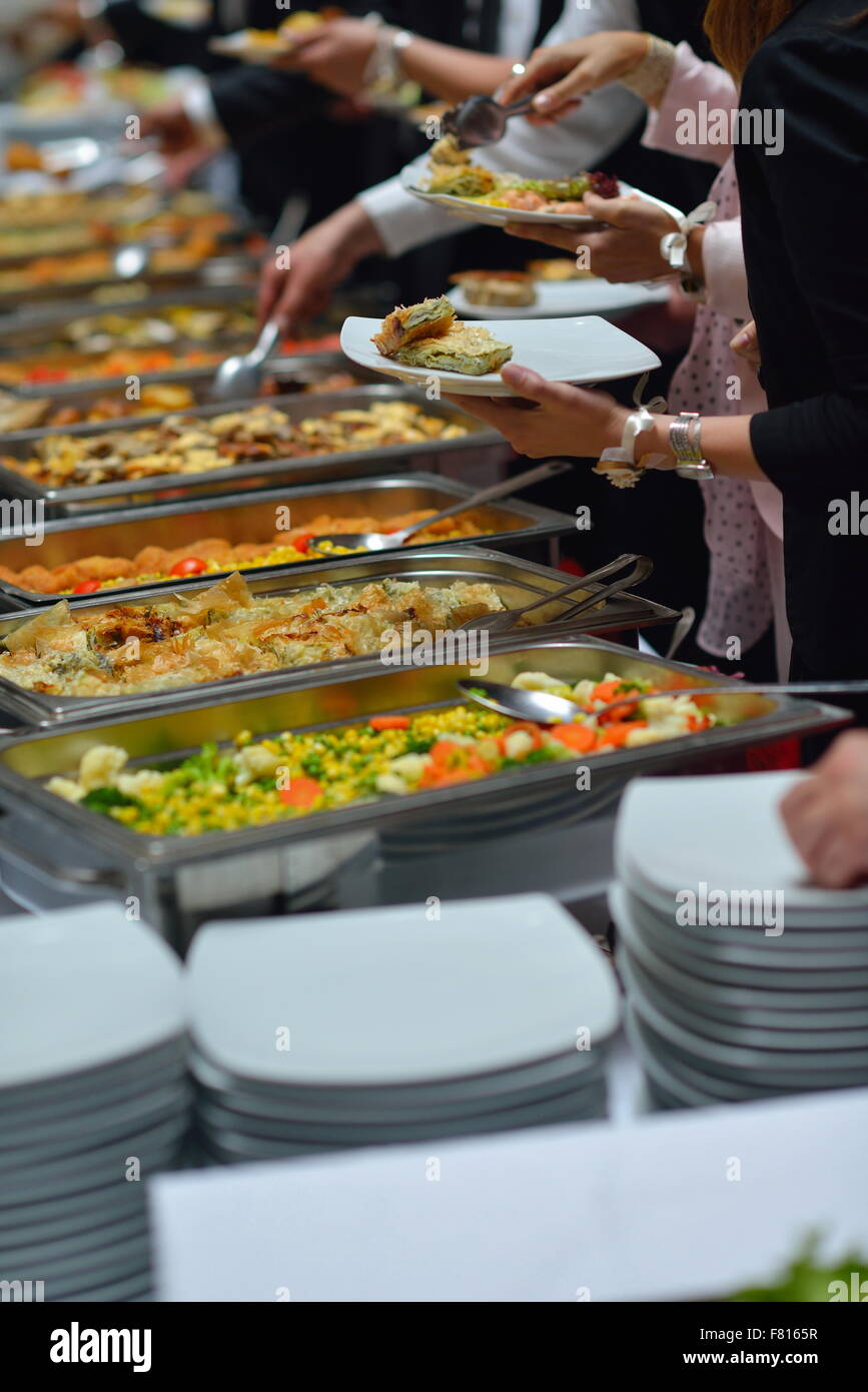 people group catering buffet food indoor in luxury restaurant with meat ...