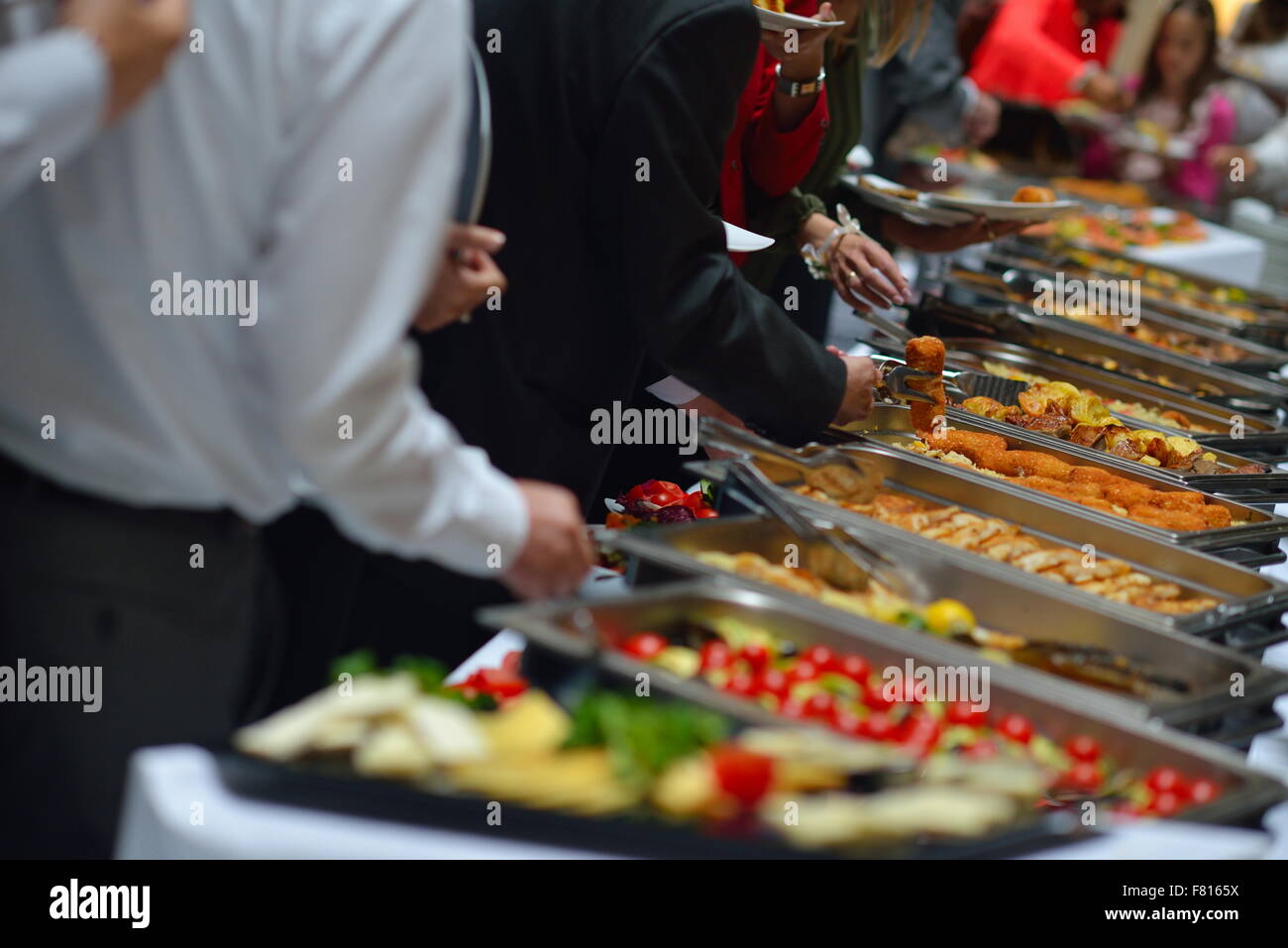 people group catering buffet food indoor in luxury restaurant with meat ...