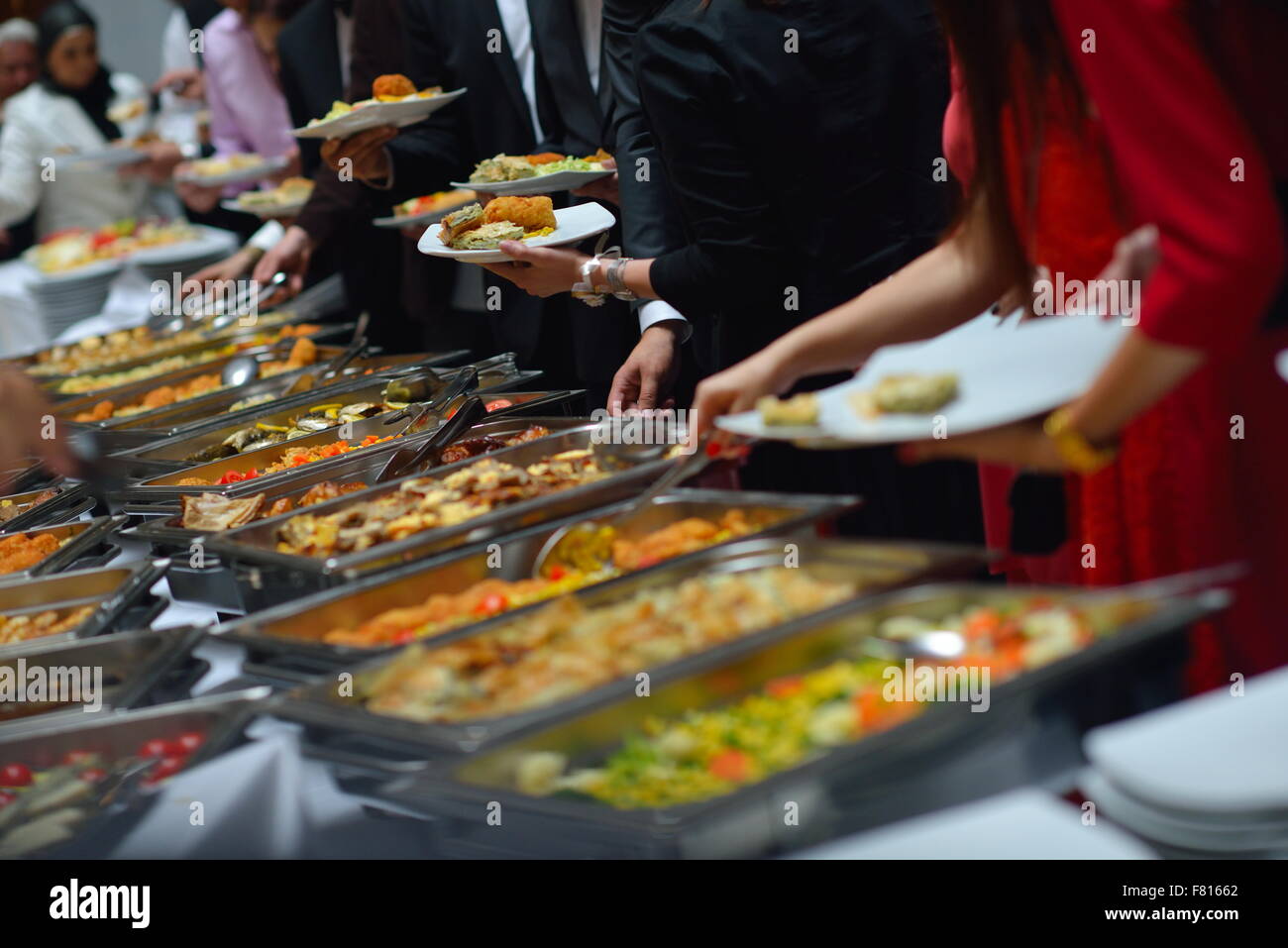 people group catering buffet food indoor in luxury restaurant with meat ...