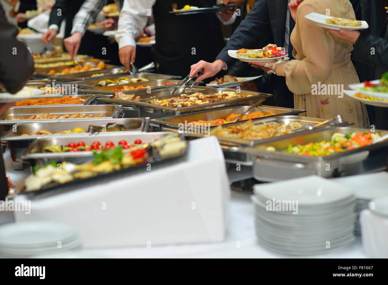 people group catering buffet food indoor in luxury restaurant with meat ...