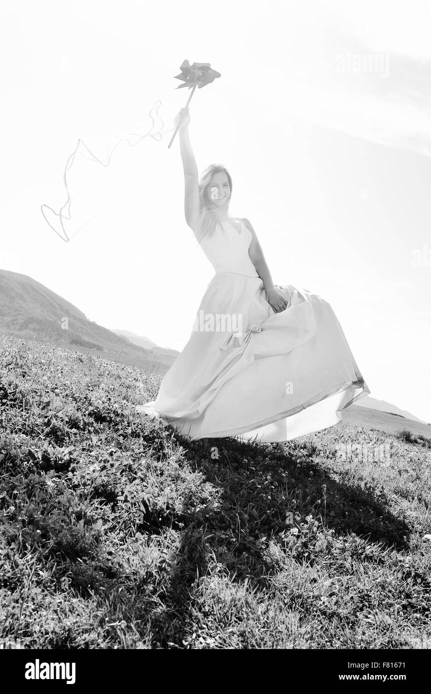 happy young beautiful bride after wedding ceremony event have fun ...