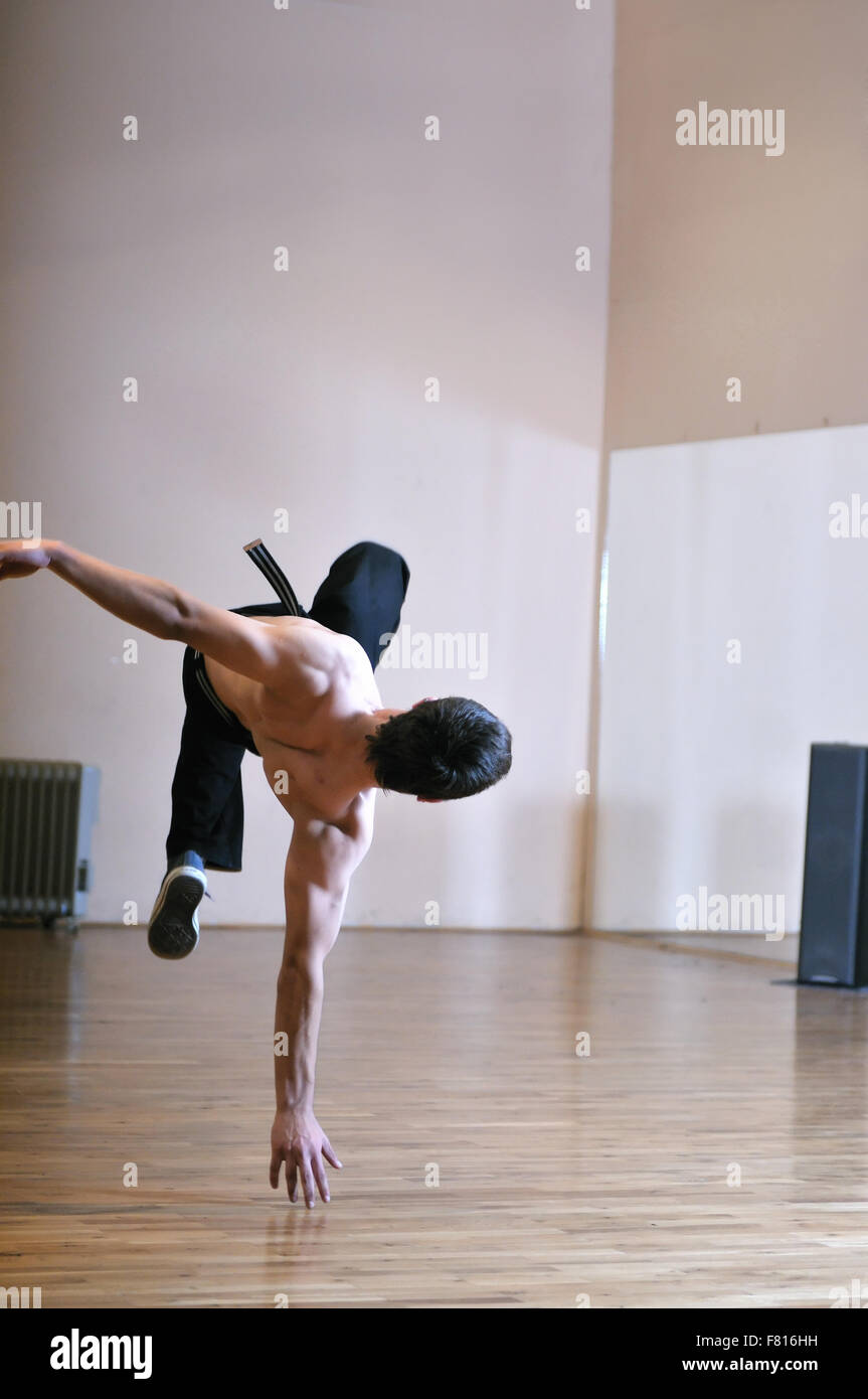 young man performing break dance in dance studio Stock Photo - Alamy