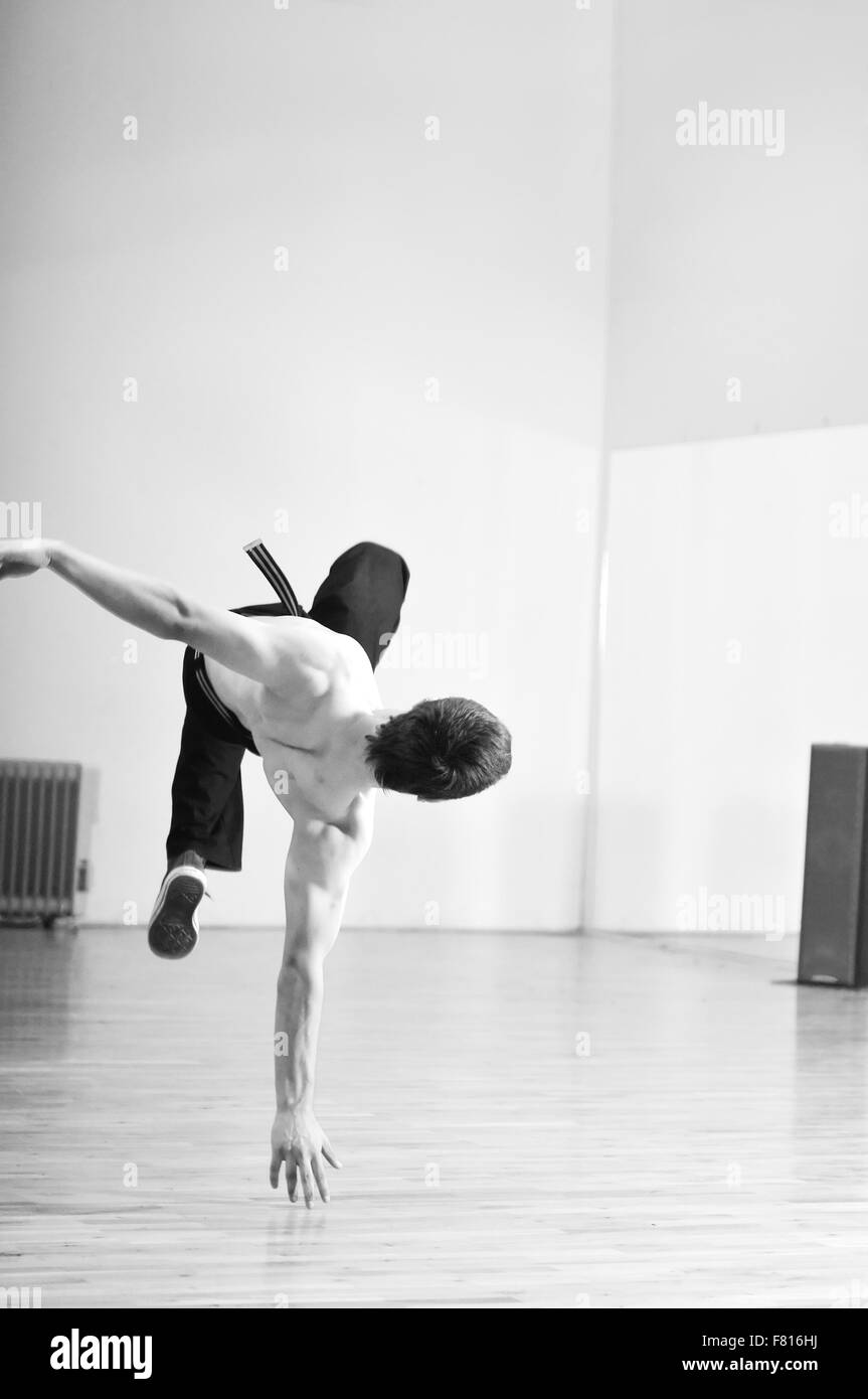 young man performing break dance in dance studio Stock Photo - Alamy