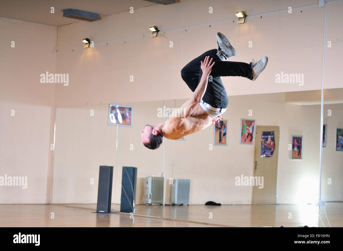 young man performing break dance in dance studio Stock Photo - Alamy