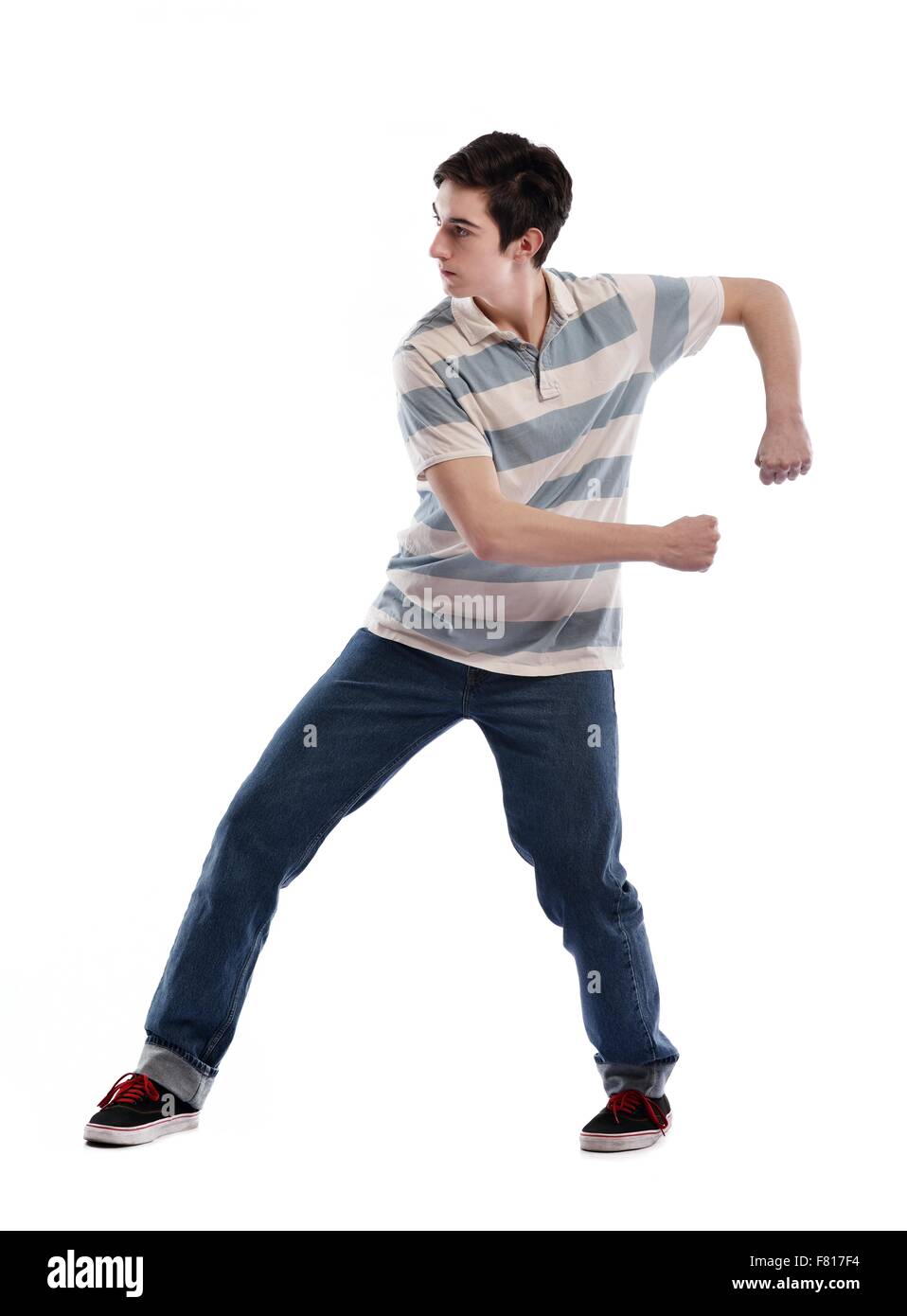 young boy man teen dancing and jumping isolated on white background in ...