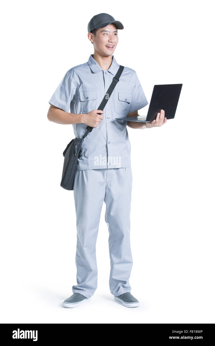 Engineer using laptop computer Cut Out Stock Images & Pictures - Alamy