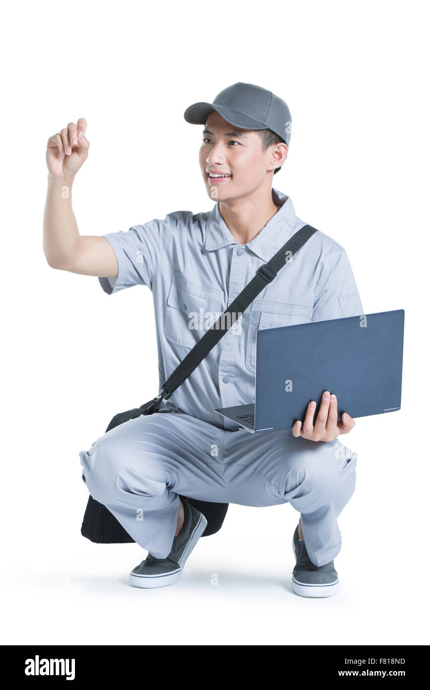 Engineer repairing laptop Stock Photo - Alamy