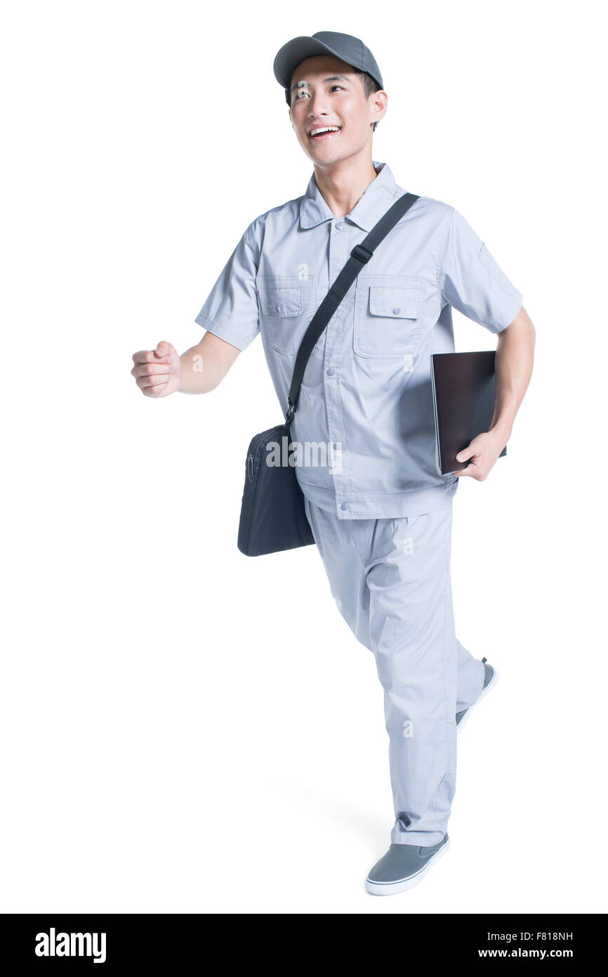 Professional man walking laptop computer Cut Out Stock Images ...